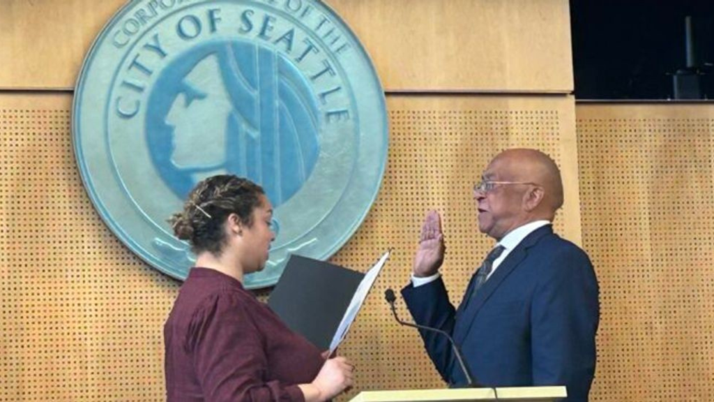 Image of Mark A. Solomon being sworn in to fill the vacant position on ...
